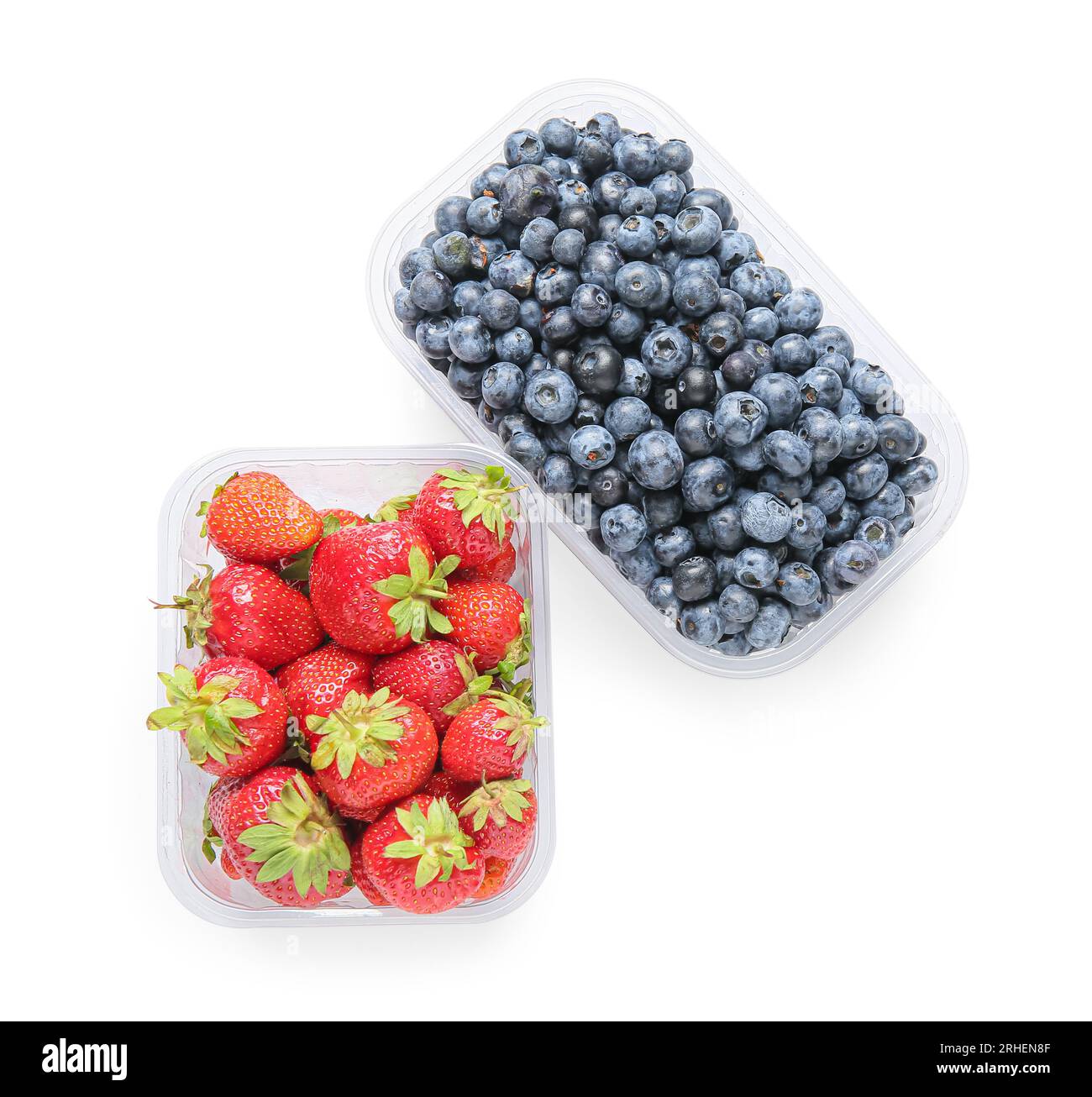 Plastic containers with fresh blueberry and strawberry on white ...