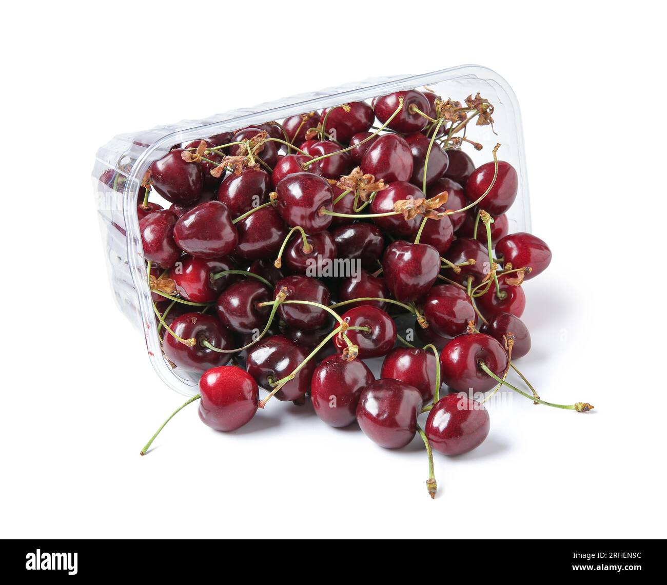 Plastic container with fresh cherry on white background Stock Photo - Alamy