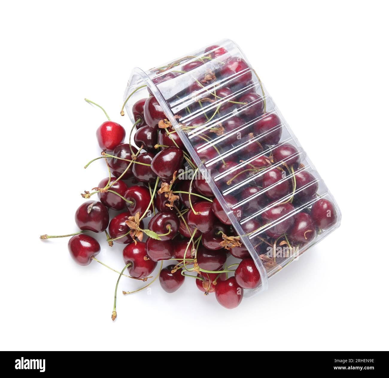 Plastic container with fresh cherry on white background Stock Photo - Alamy