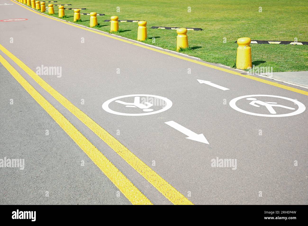View of asphalt road with signs in city, closeup Stock Photo - Alamy