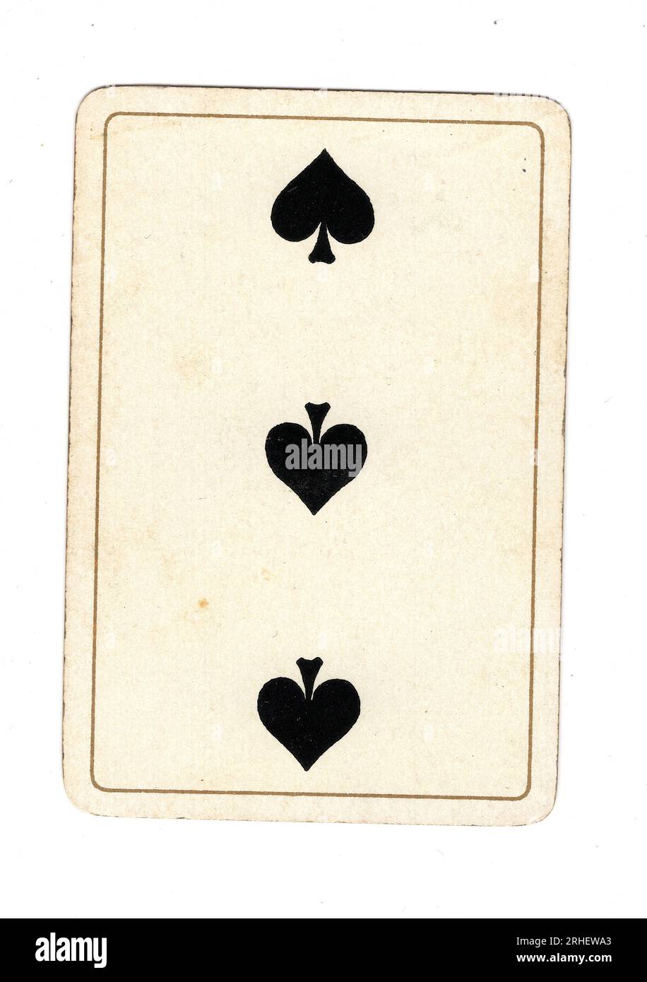 An antique three of spades playing card on a white background Stock ...