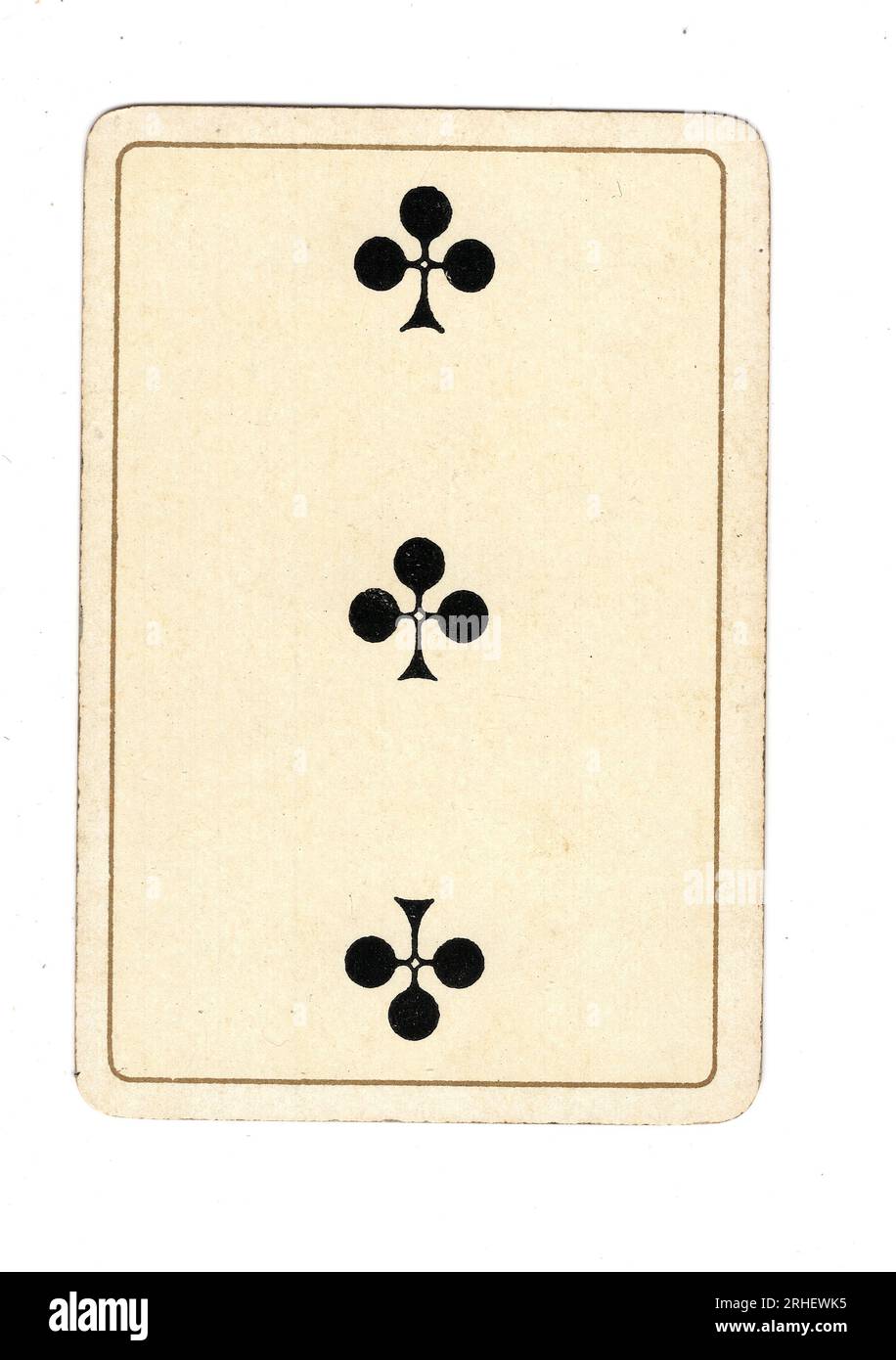 An antique three of clubs playing card on a white background Stock ...