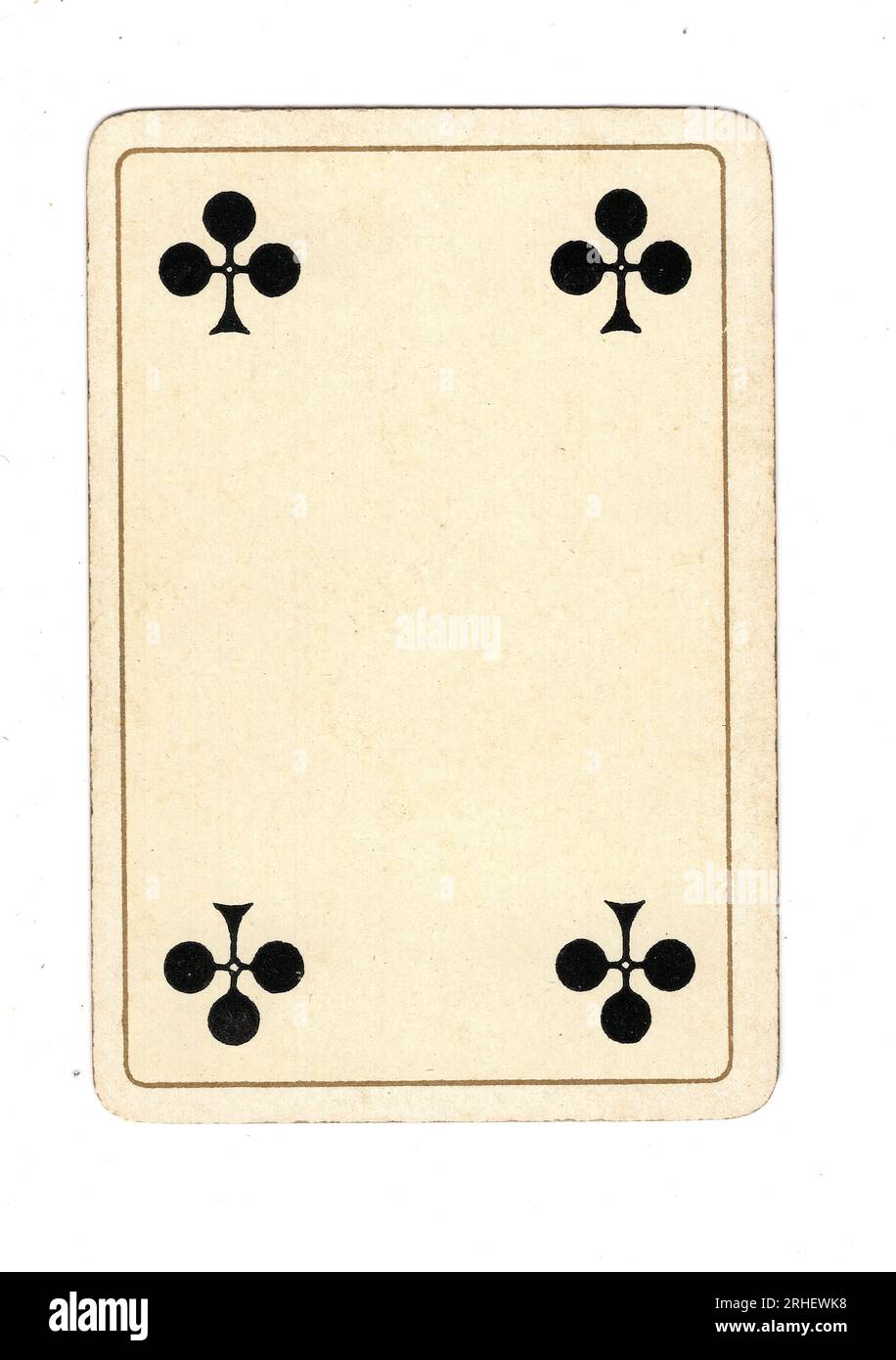 An antique four of clubs playing card on a white background Stock Photo ...