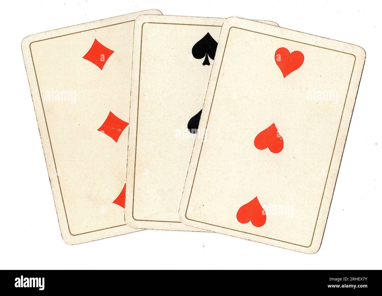 Antique playing cards featuring three threes on a white background ...