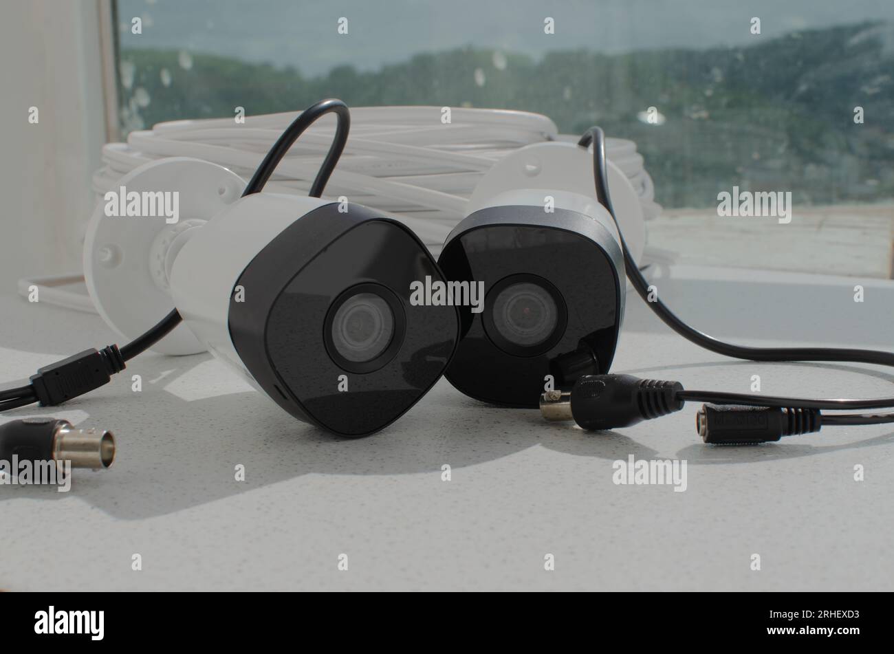 Close-up security camera with wire roll, providing real-time guarded ...