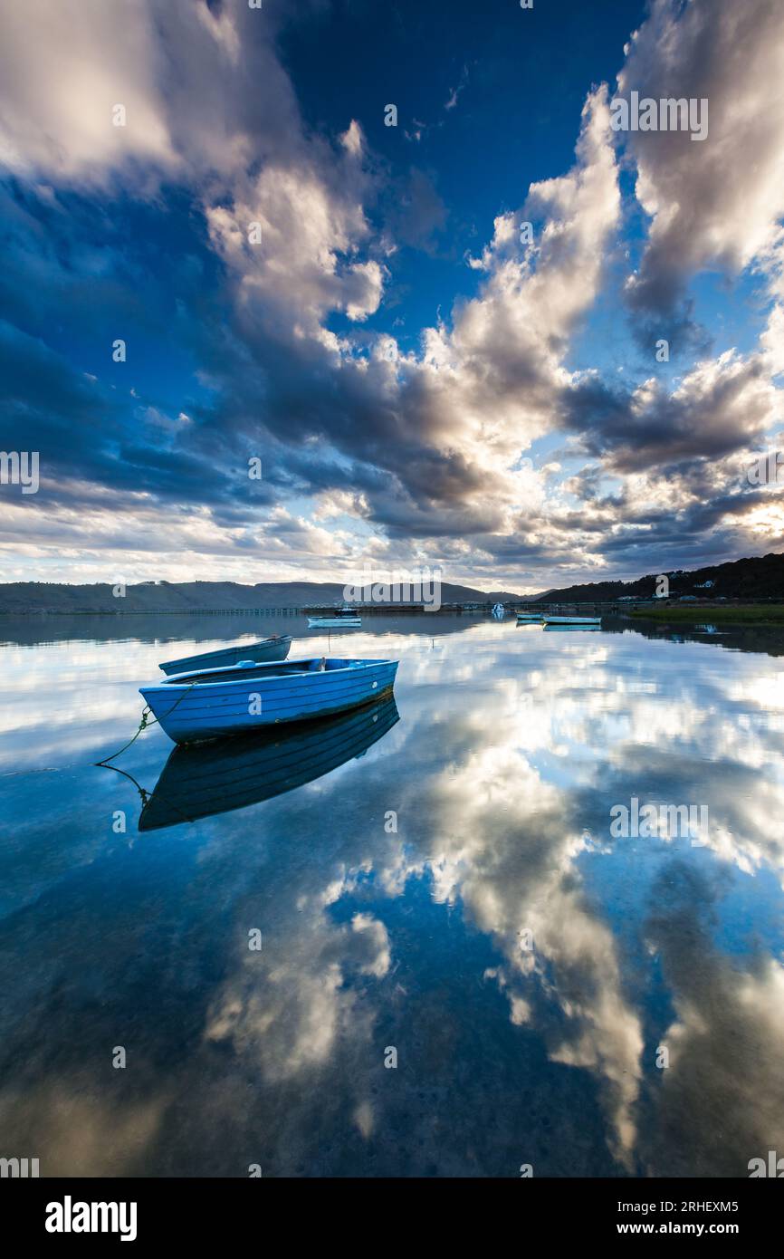 Landcape scenery photograph of row boats on lagoon estuary in Knysna ...
