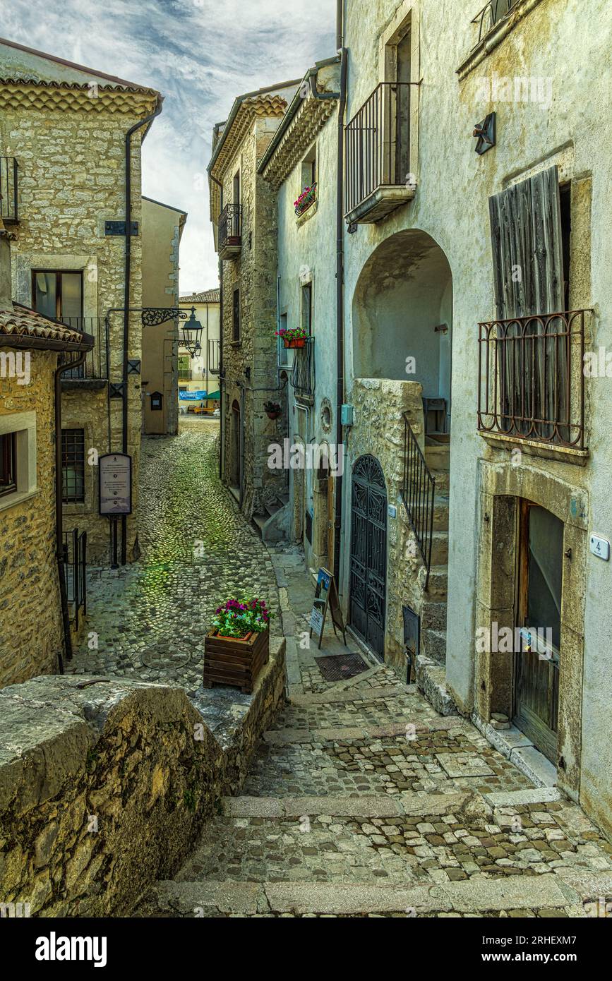 Via Castello, with its stone houses, alleys and stairways of the ...