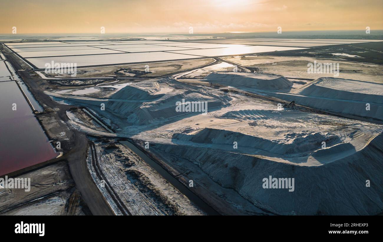 Aerial view of pink salt lake. Salt production plants evaporated brine ...