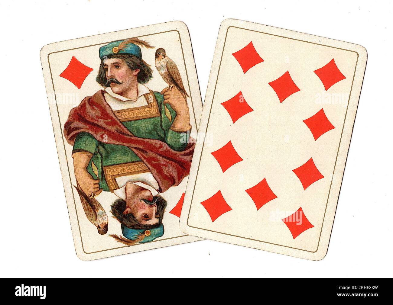A pair of antique playing cards showing a jack and ten of diamonds on a ...