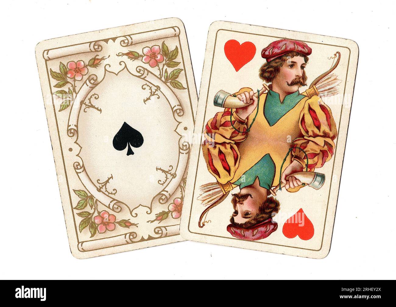 A pair of antique playing cards showing an ace of spades and jack of ...