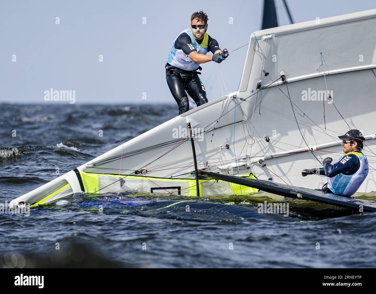 SCHEVENINGEN - Logan Dunning-Beck and Oscar Gunn of New Zealand capsize ...