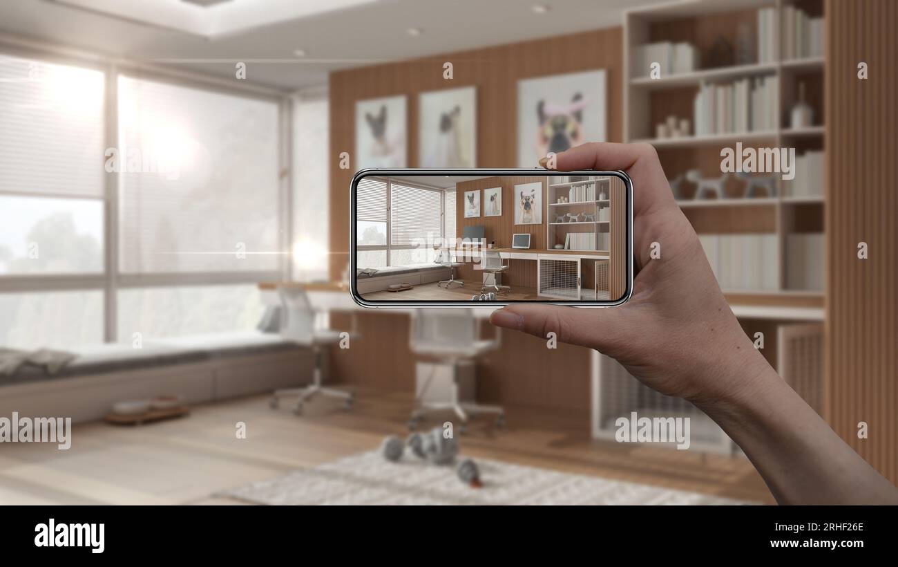 Hand holding smart phone, AR application, simulate furniture and ...