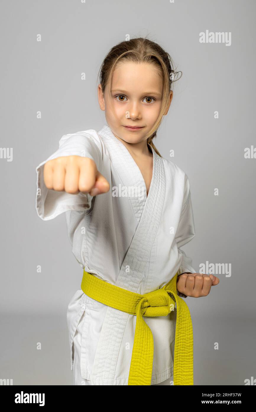 Caucasian girl practises karate, studio shot Stock Photo - Alamy