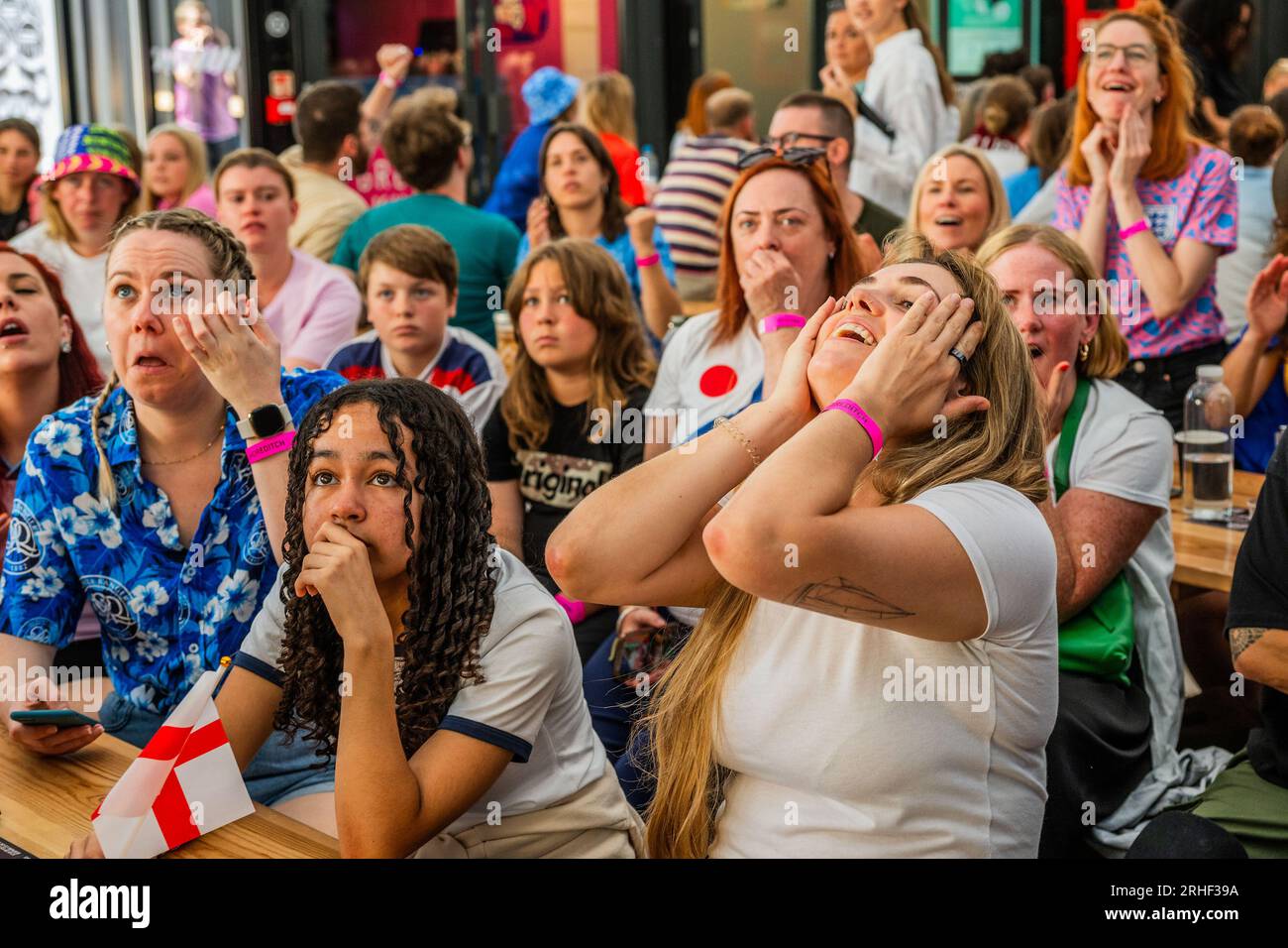 London, UK. 16th Aug, 2023. Tense moments - Fans in the Boxpark ...