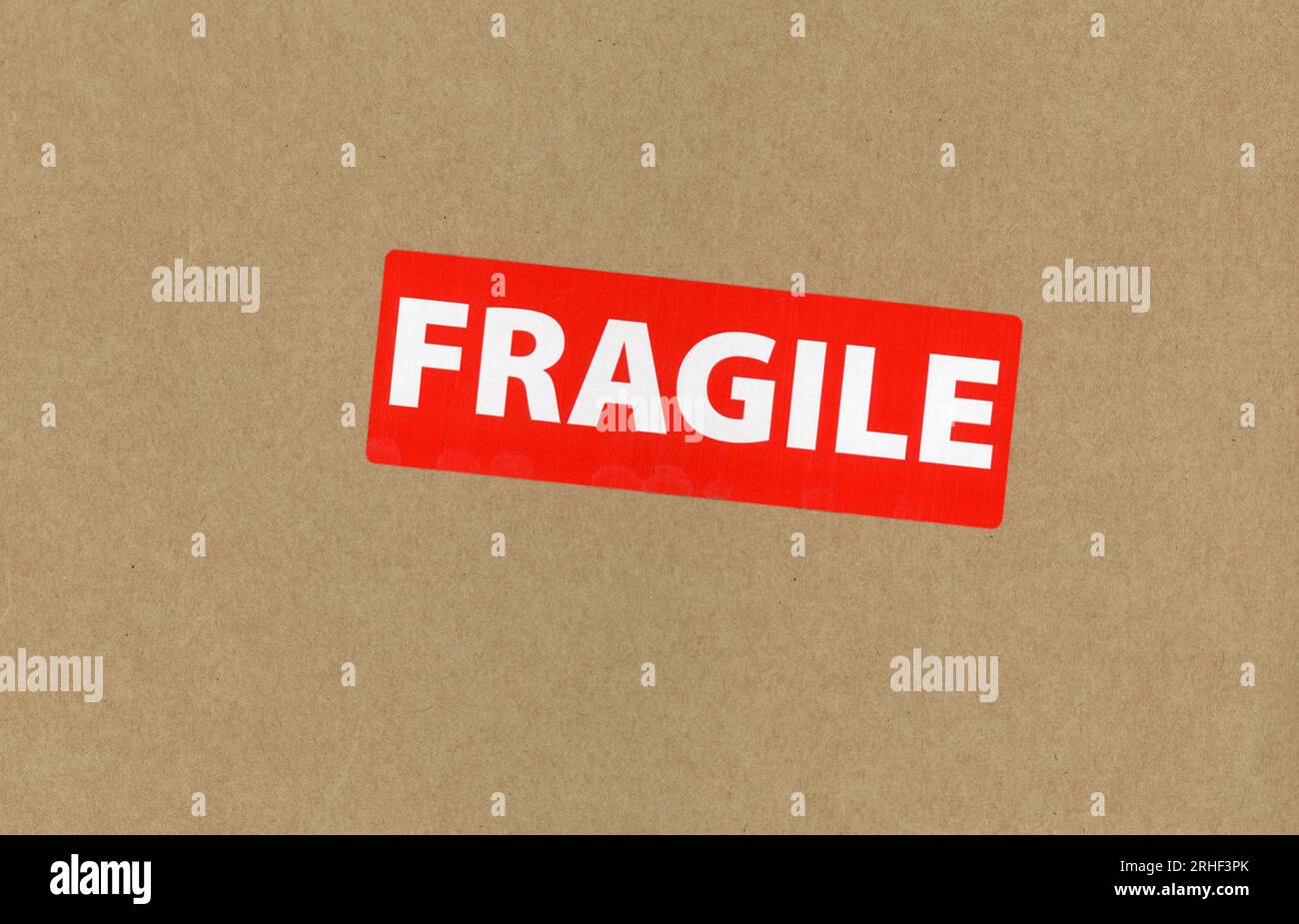fragile label on a corrugated cardbord box Stock Photo - Alamy
