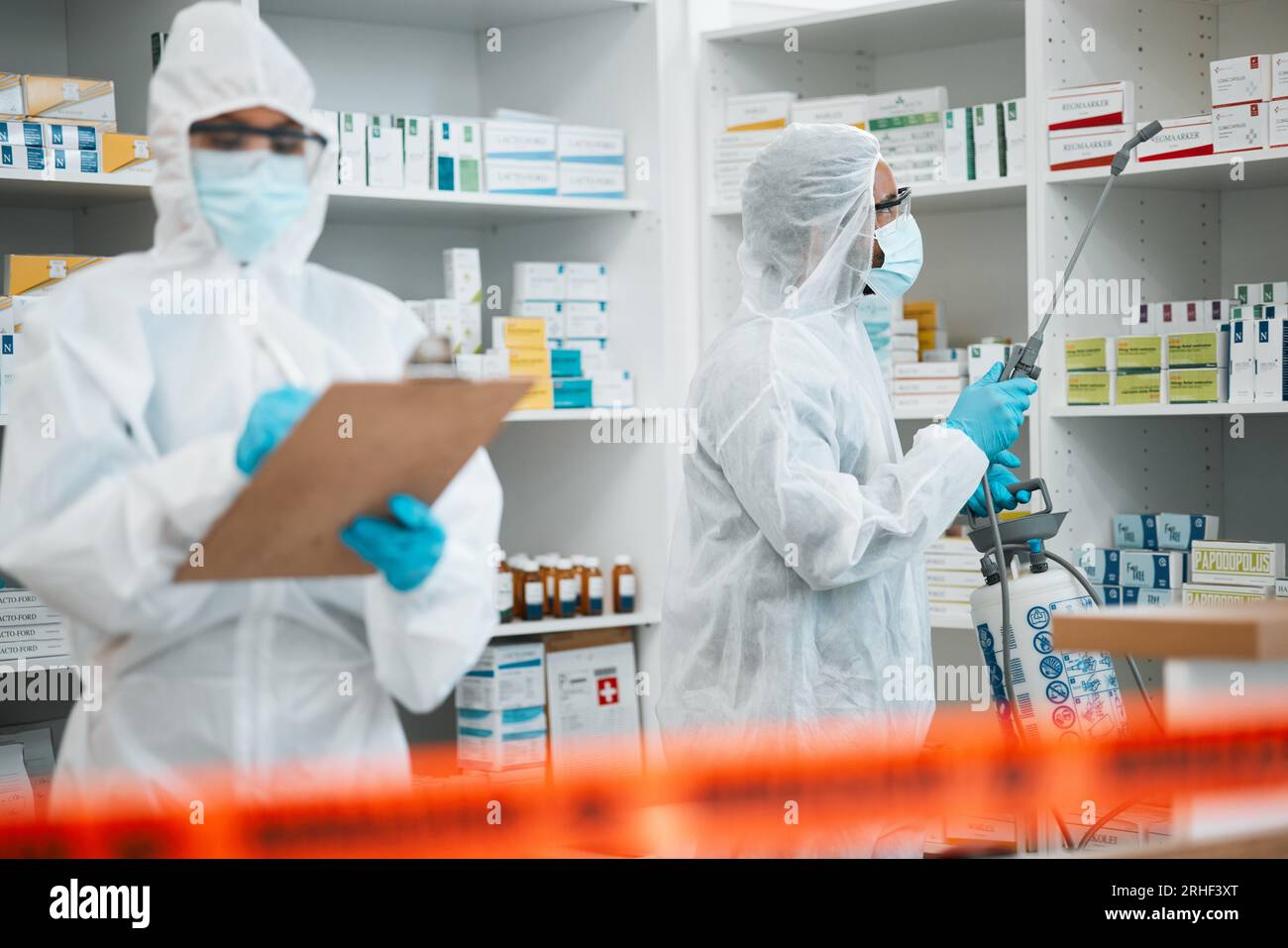 Pharmacy clipboard, red tape or people spray chemical for protection ...