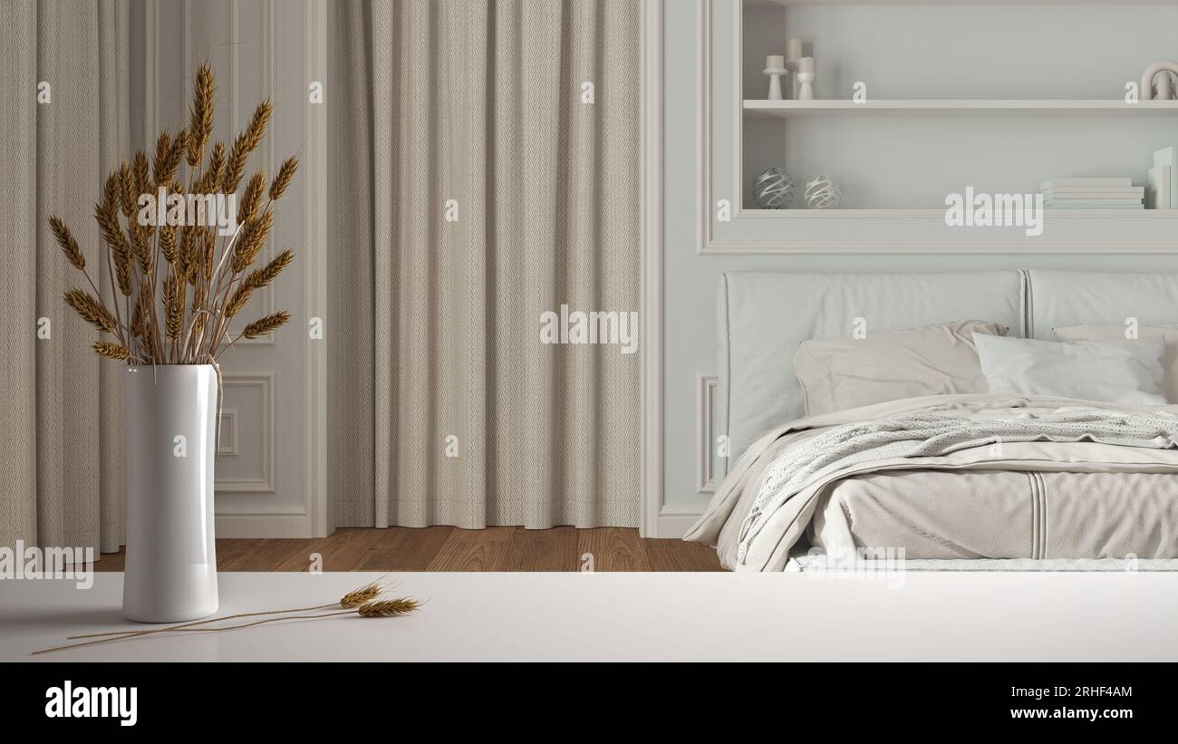 White table top or shelf with straws, dry plants, ornament, ears, sheaf ...