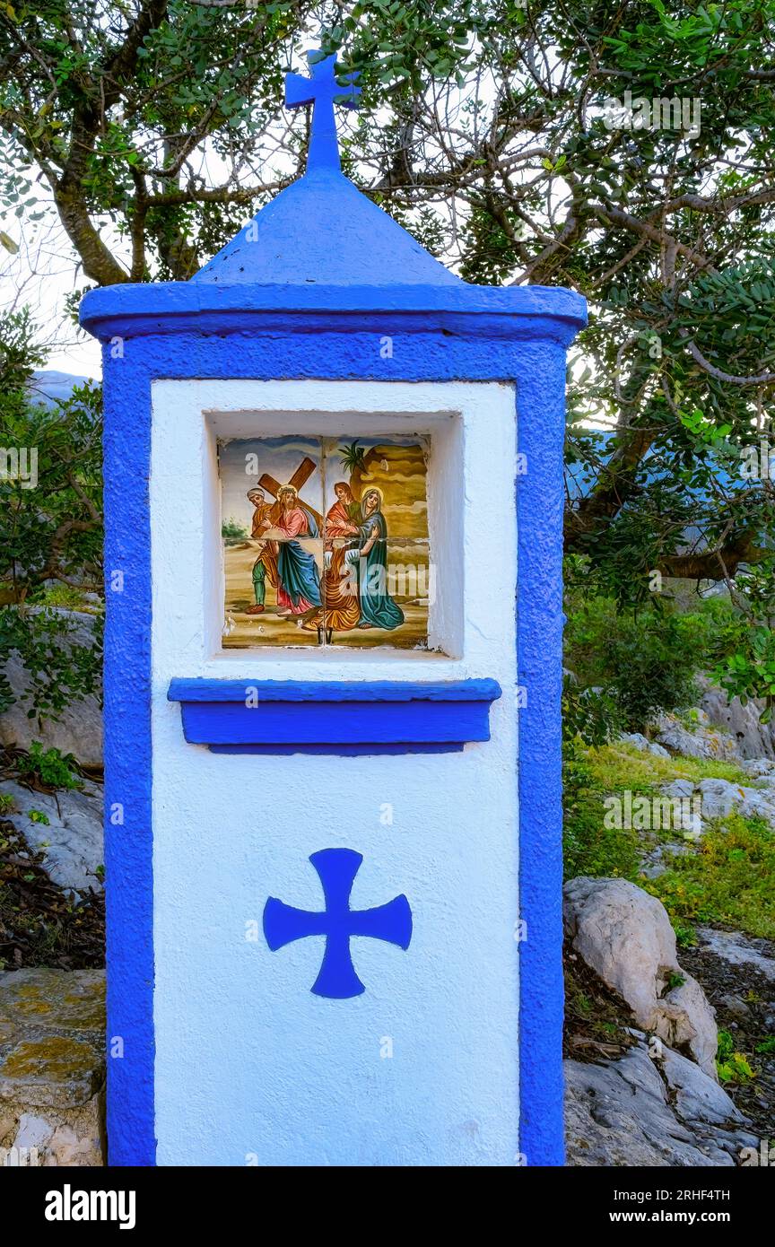 Guadalest, Alicante, Spain, a cement booth or structure with a Catholic ...