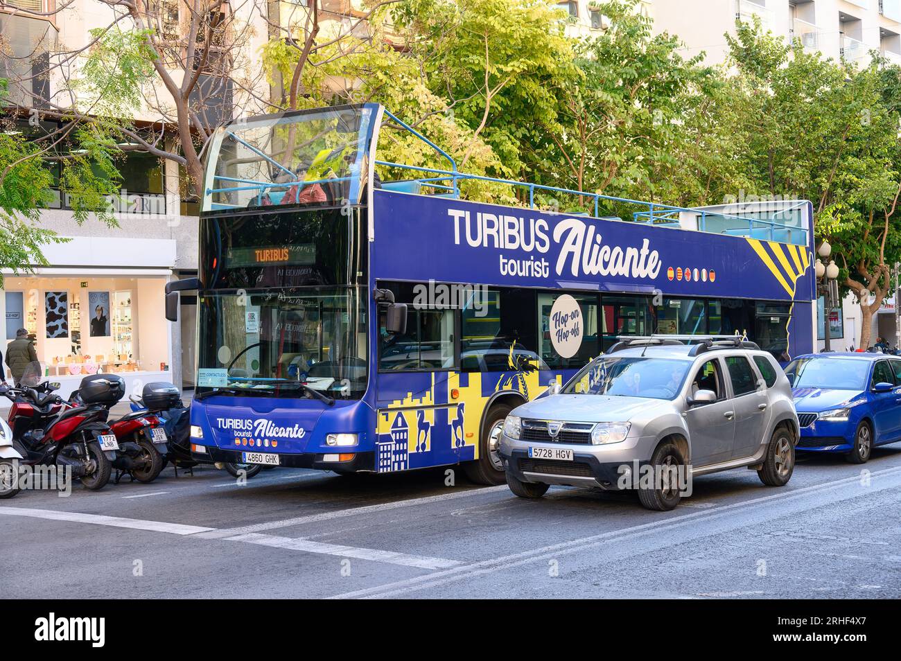 Alicante, Spain, a double-decker tourism bus drives alongside other ...