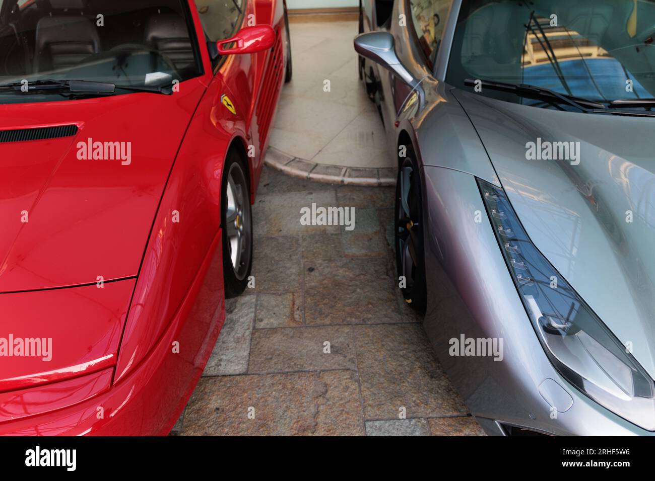 Ferrari Testarossa (left) and Ferrari 488 (right) side by side in a ...