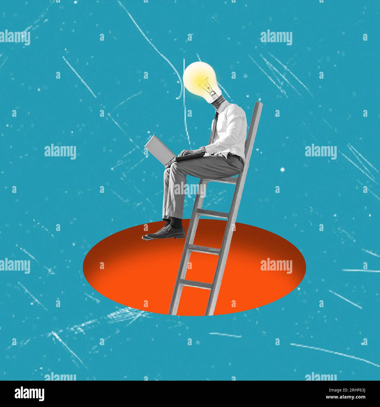 A developer with a laptop sits on a ladder. A new idea. A business ...