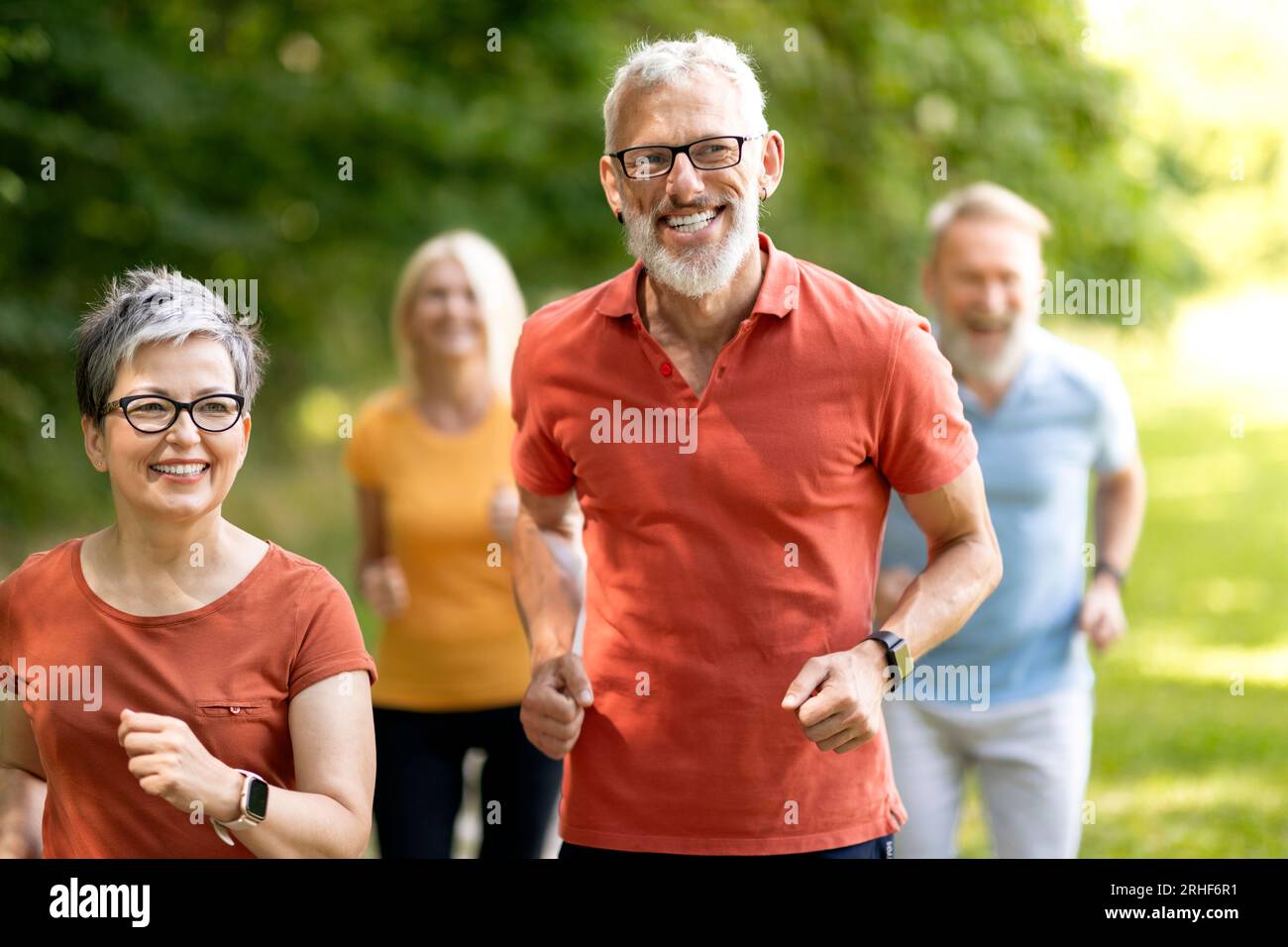 Happy people group running hi-res stock photography and images - Alamy