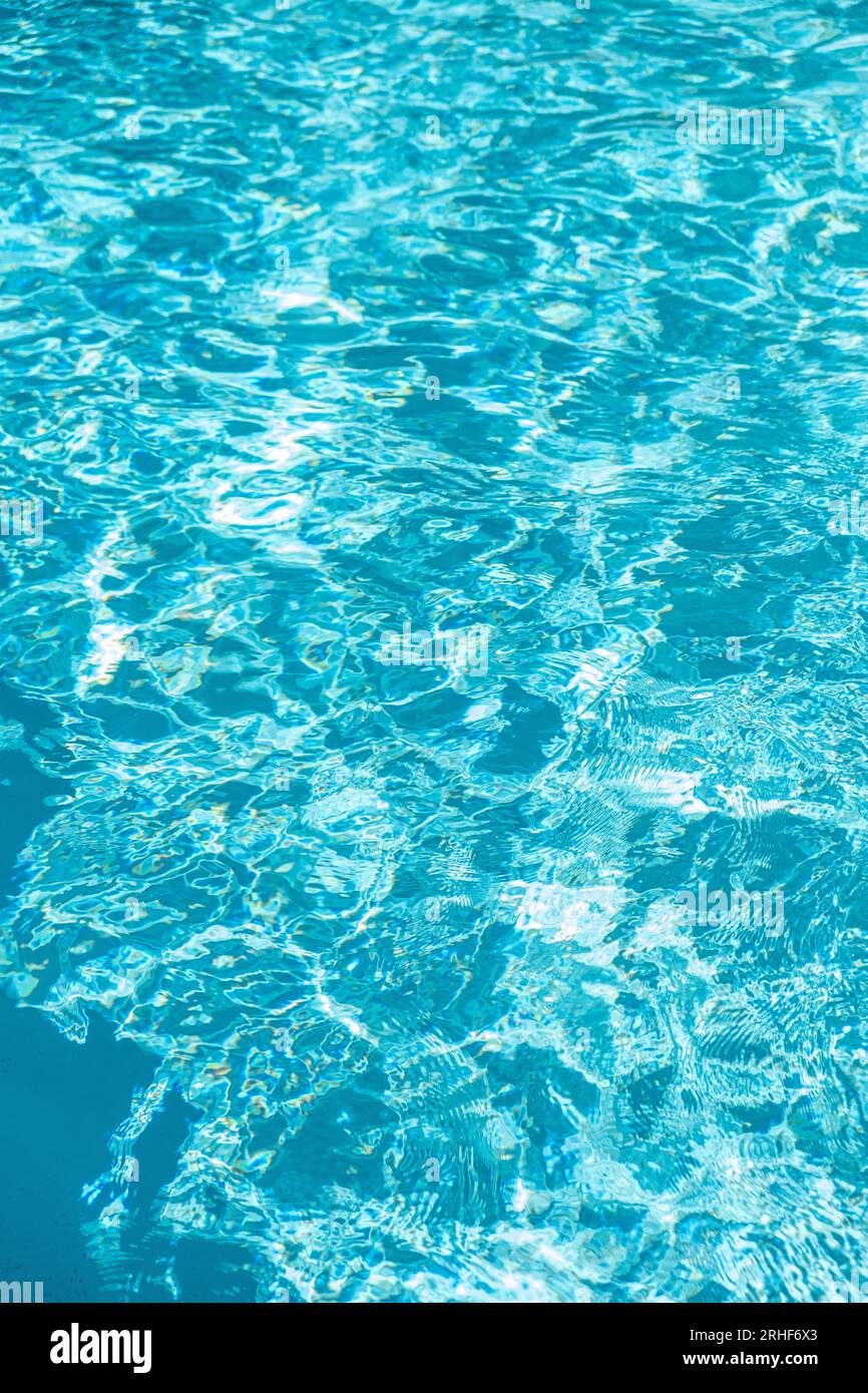 Blue ripped water in swimming pool Stock Photo - Alamy