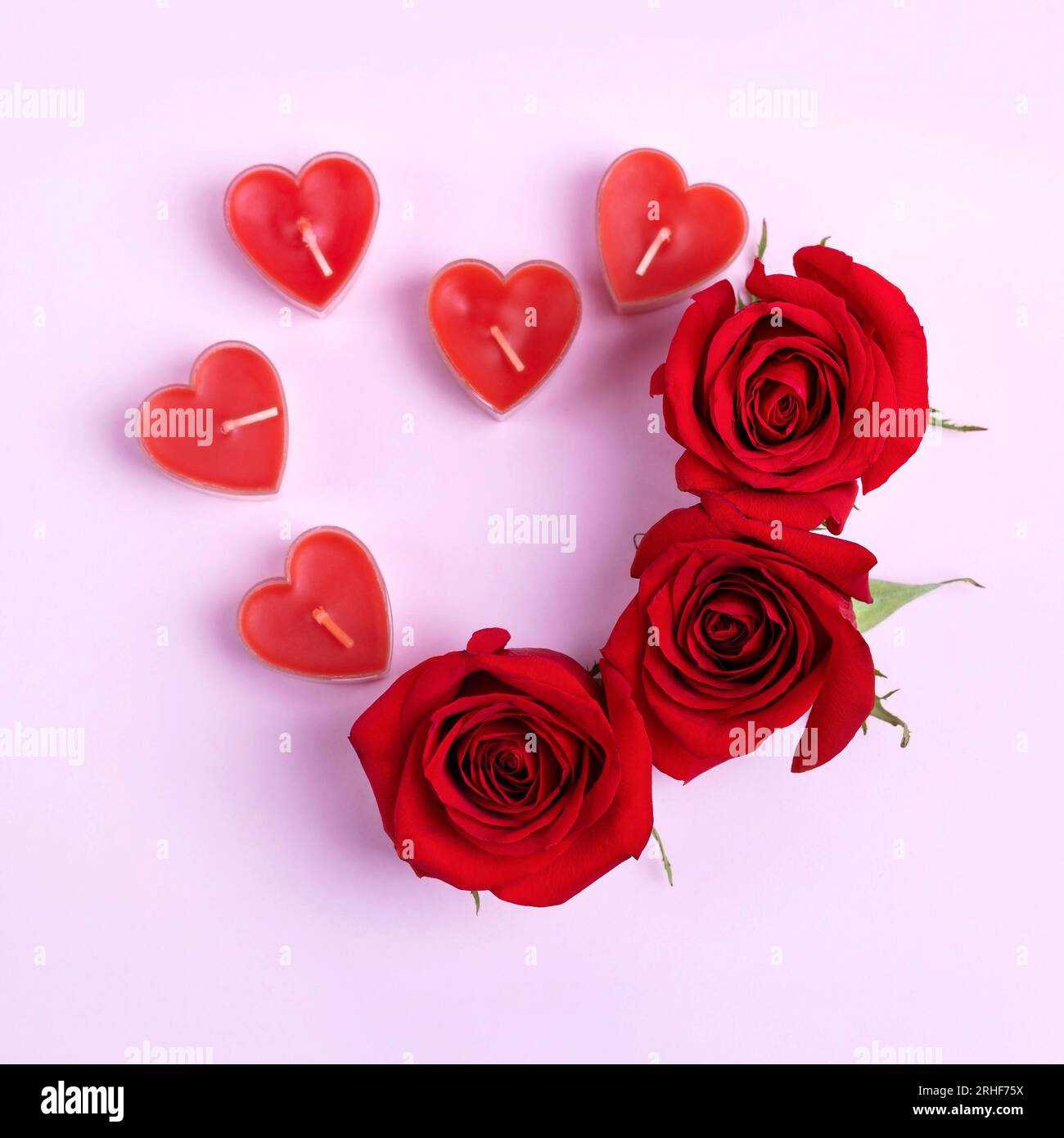 Romantic concept roses candles hi-res stock photography and images - Alamy