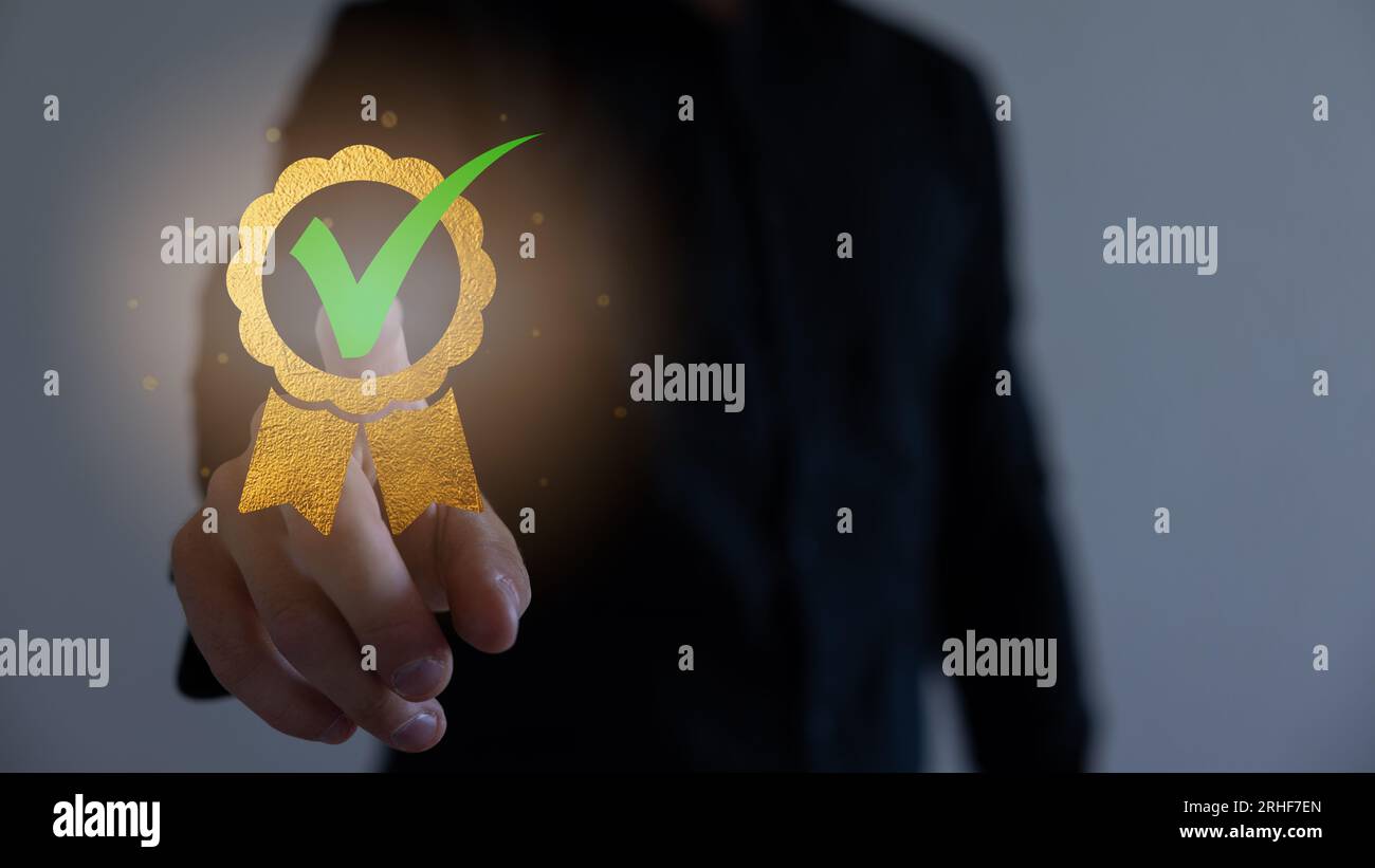 Businessman touching virtual screen icon of the best quality assurance ...