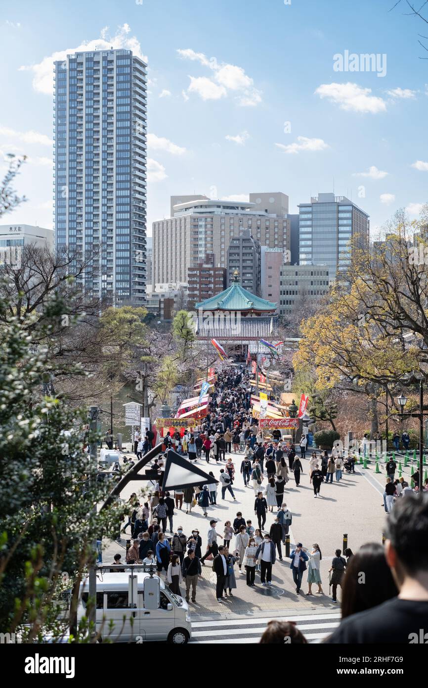 View towards Gojoten-jinja Shrine, with tourists at food stalls in front, Ueno Park, Ueno, Tokyo ...