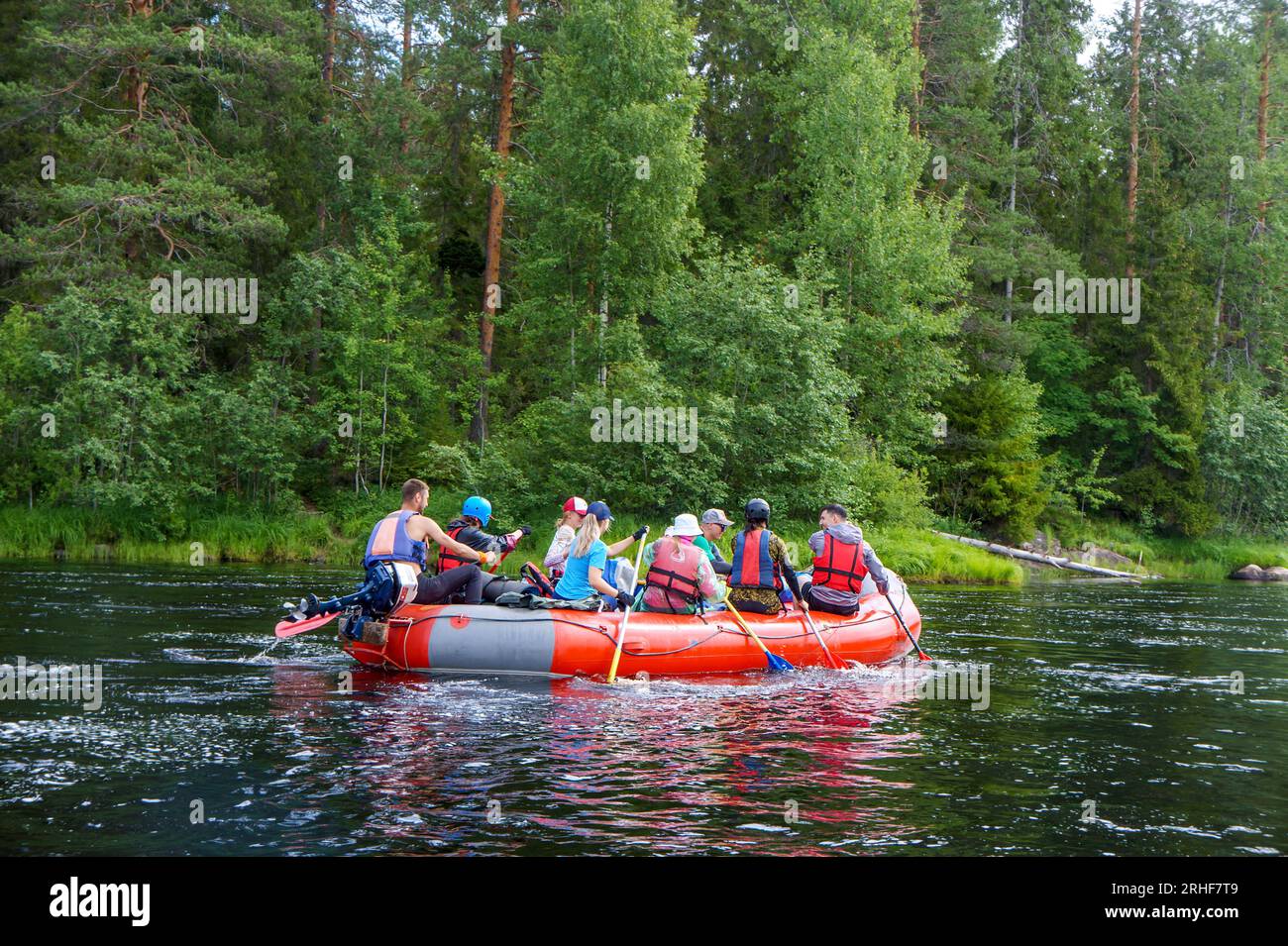 Karelia, Russia, 18/07/2023. Raft on the river. Red raft goes on a ...