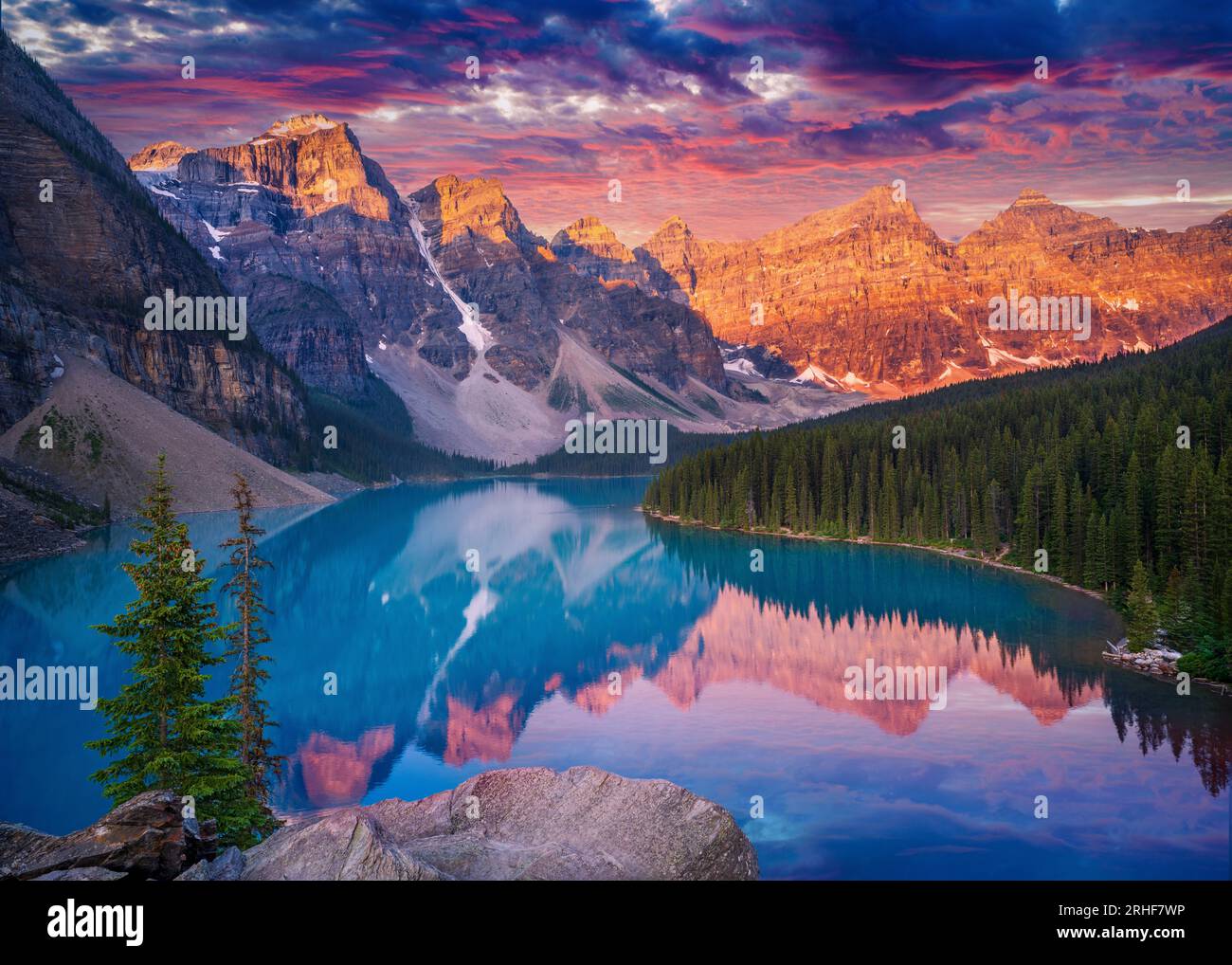 Alpenglow during a colorful Sunrise, Moraine Lake during summer in ...