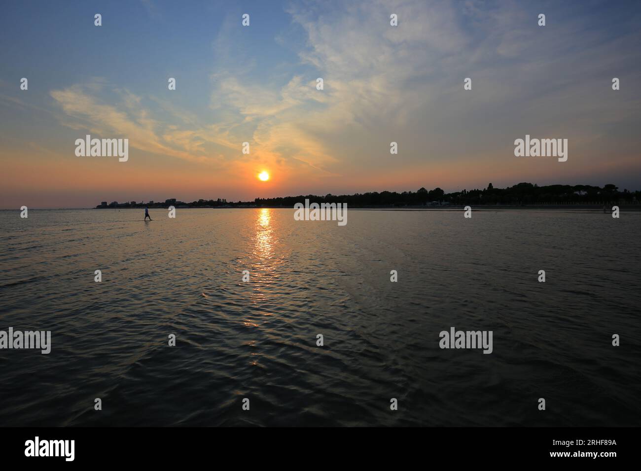 Landscape sunset on the sea in Grado city Stock Photo - Alamy