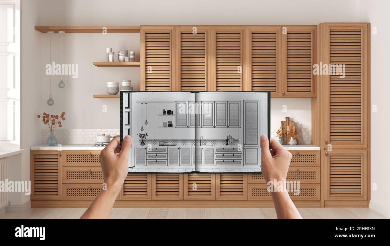 Hands holding notepad with cozy wooden kitchen design blueprint sketch ...