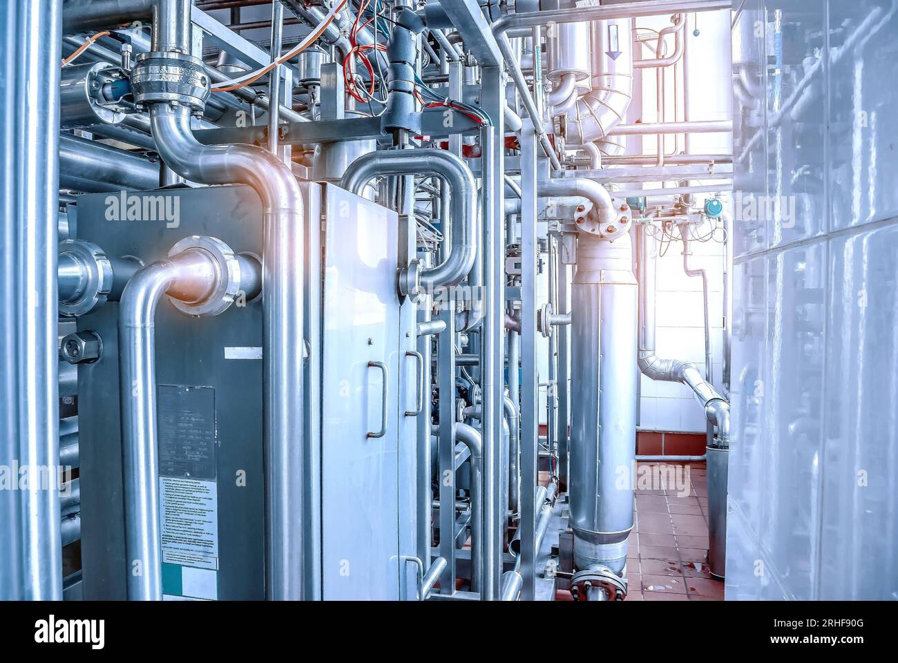 Stainless steel pipes in the factory. Construction on food production ...