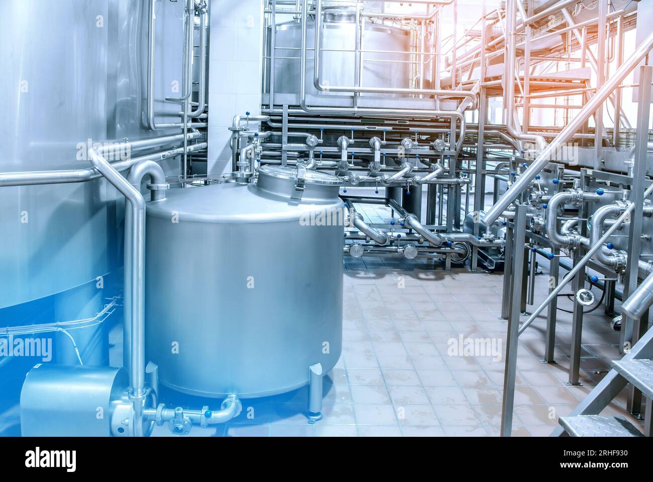 number of steel tanks for mixing liquids. Stainless steel, food ...