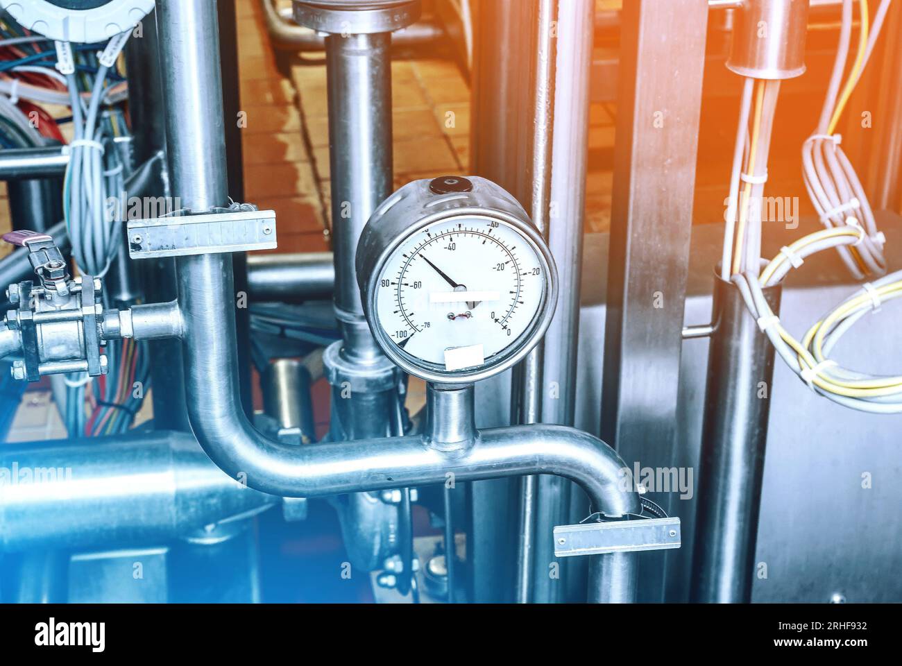 Stainless steel pipes in the factory. Construction on food production ...