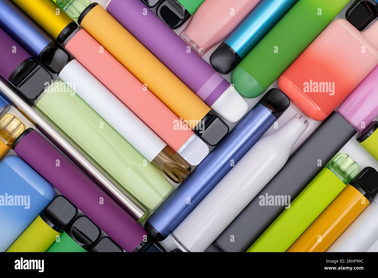 Synthetic nicotine concept. Various disposable electronic cigarettes ...