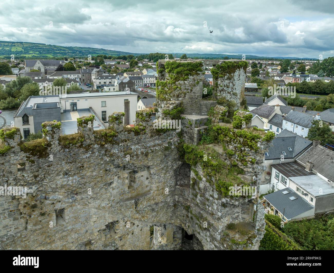 Aerial view of Carlow castle and town in Ireland with circular towers ...