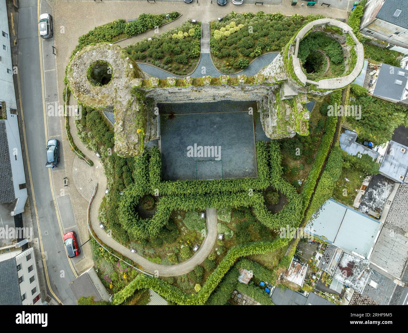 Aerial view of Carlow castle and town in Ireland with circular towers ...