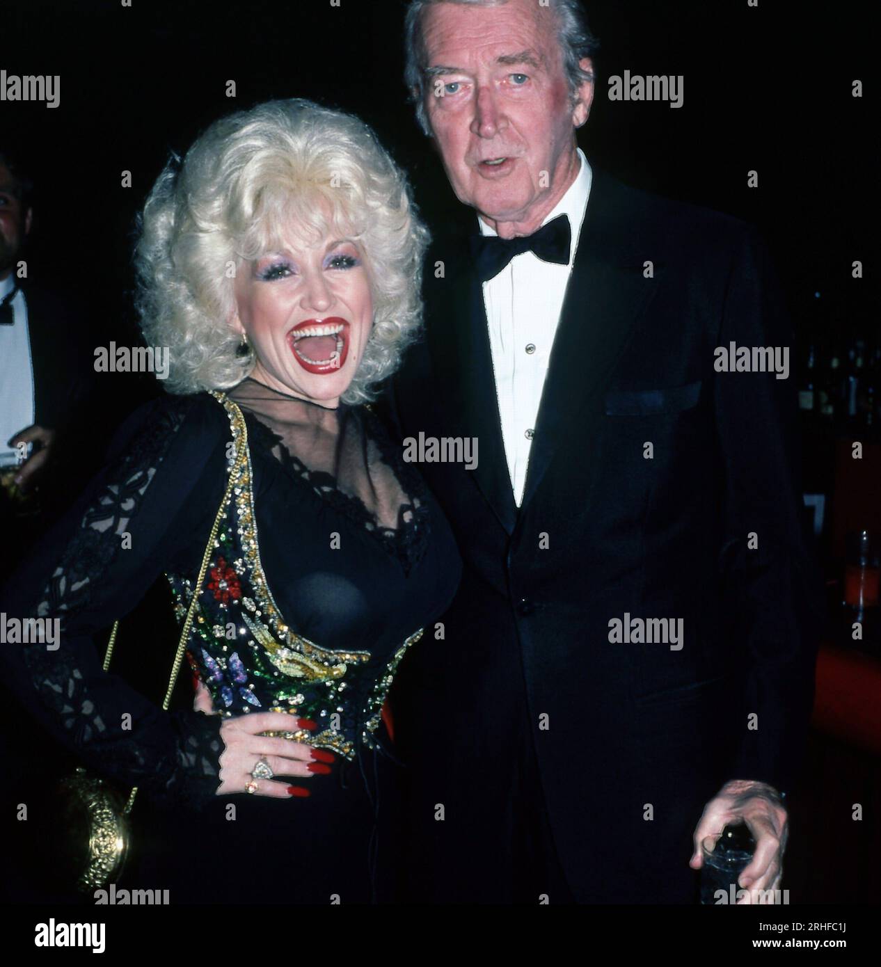 Country singer and actress Dolly Parton is laughing with iconic classic ...