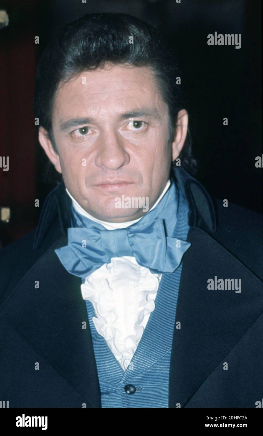 American singer-songwriter Johnny Cash in a frontal close-up, wearing a ...