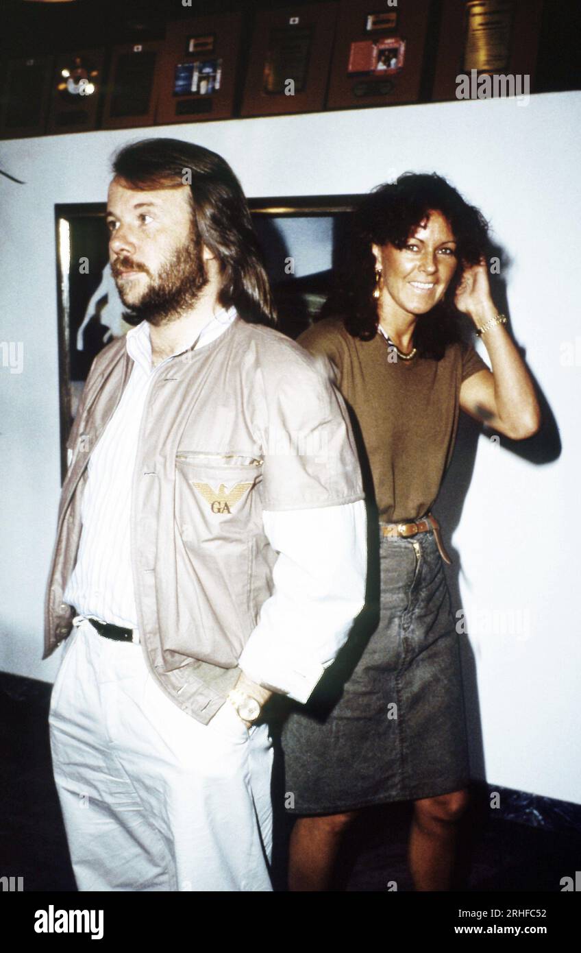 Benny Andersson hands in pockets and a smiling Anni-Frid Lyngstad of ...