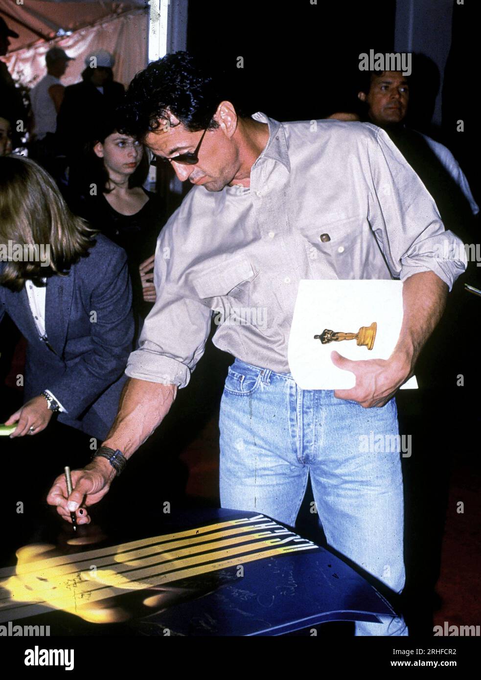 Sylvester Stallone during rehearsals, signing an Oscar Poster backstage ...