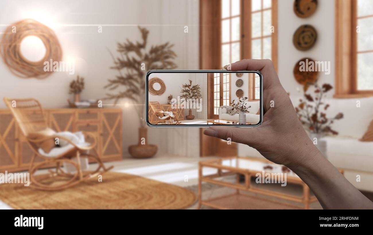 Hand holding smart phone, AR application, simulate furniture and ...