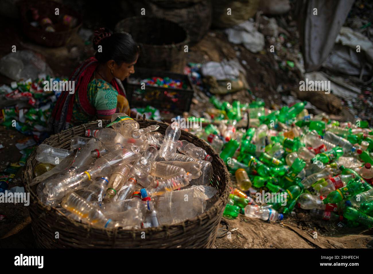 A woman works at a plastic recycling plant in Dhaka, Bangladesh Stock ...