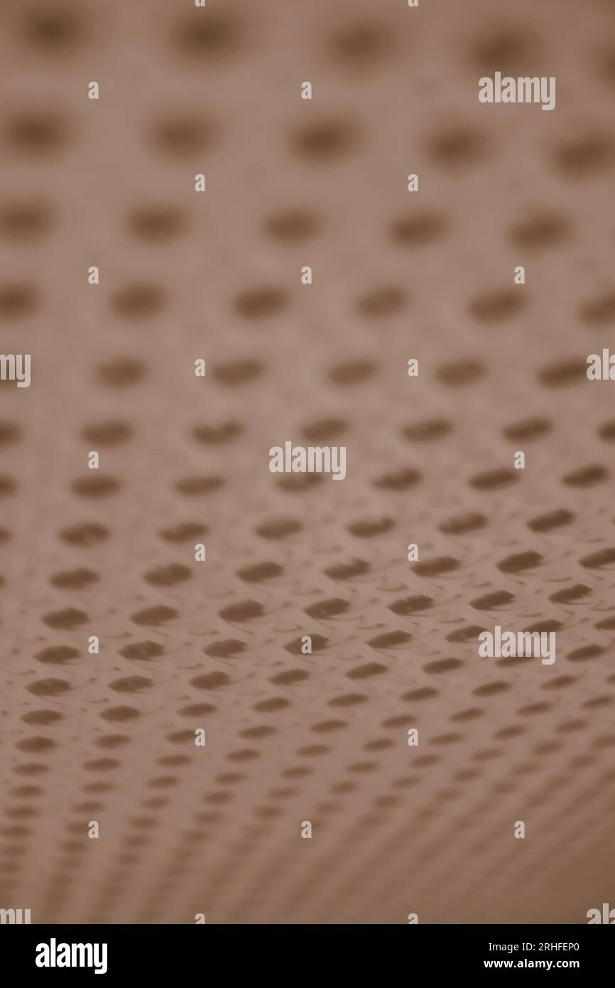 Abstract blurred spotted brown pattern texture with holes on the ...