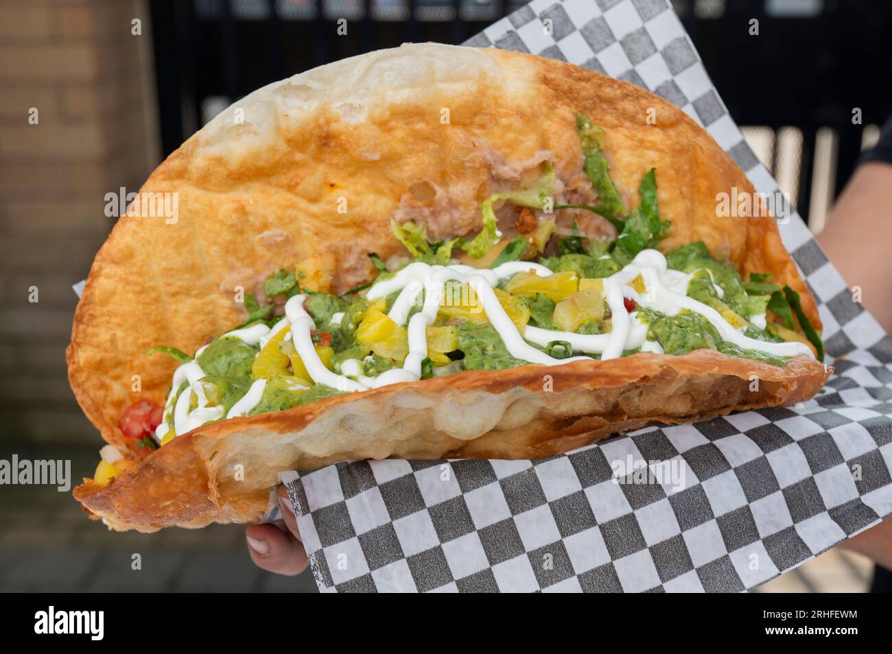 Toronto, Canada. 16th Aug, 2023. An employee from the Machete food ...