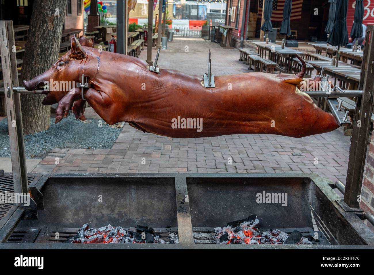 Whole hog slow roasting for barbecue at Rainey Street restaurant in ...