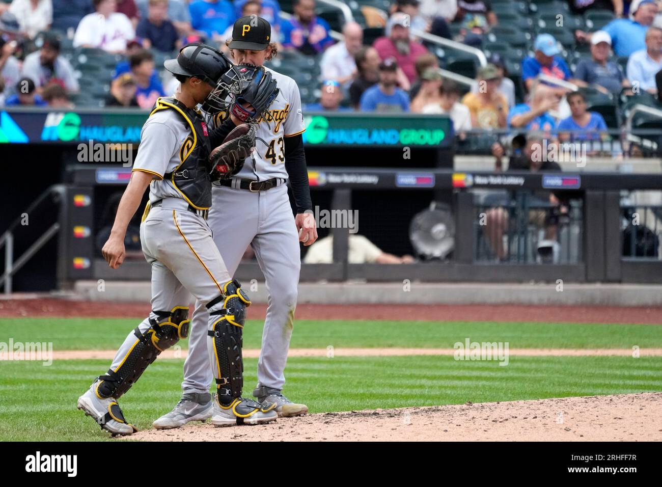 Pittsburgh Pirates catcher Endy Rodriguez has a mound conference with ...